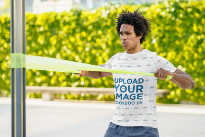 Placeit - T-Shirt Mockup of a Man Running up a Stairway