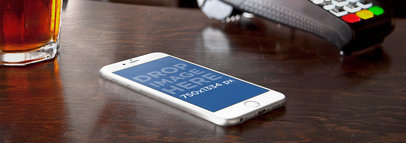 Placeit - Mockup of an iPhone 6 At Counter Bar
