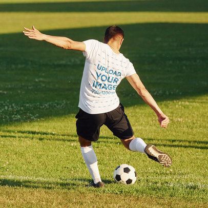 Placeit - Back-View Tee Mockup of a Soccer Player at a Field