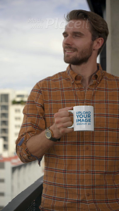Placeit - Video of a Serious Man Holding an 11 oz Coffee Mug