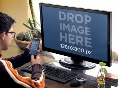 Placeit - Mockup of an iPhone 6 and a PC on a Desk with Christmas Decor