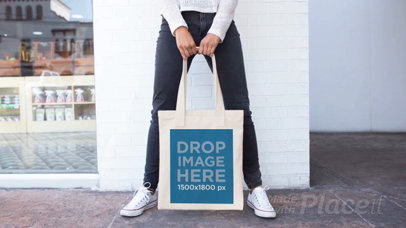 Placeit - Beautiful Woman Playing With a Tote Bag in Stop Motion