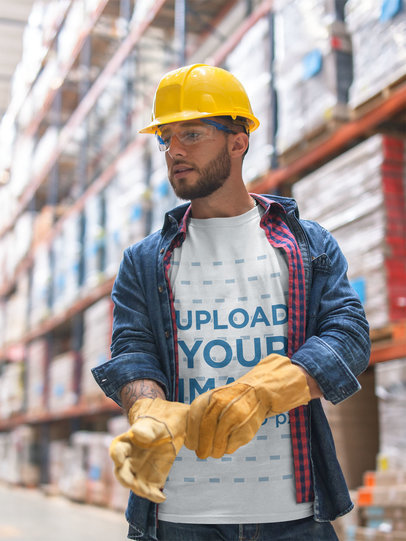 Placeit - Smiling Warehouse Worker Wearing a T-Shirt Mockup