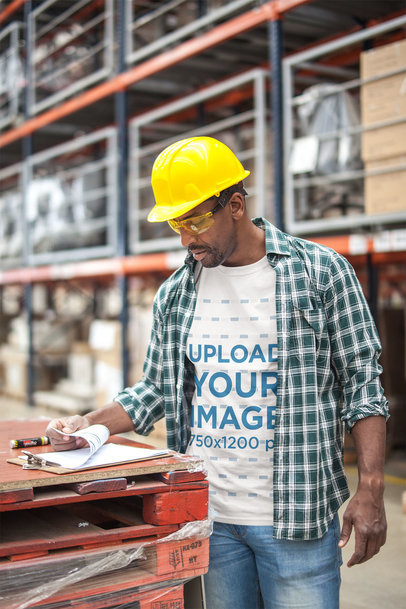 Placeit - Transparent Warehouse Worker Wearing a T-Shirt Mockup While ...