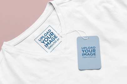 Placeit - Mockup of a Brand Tag Placed on a Onesie