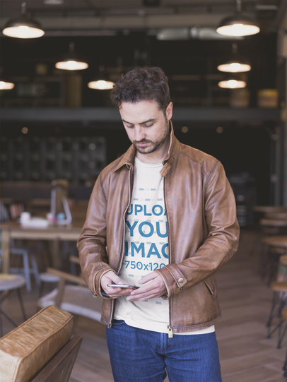 Placeit - Transparent T-Shirt Mockup of a Man Sending a Text Message