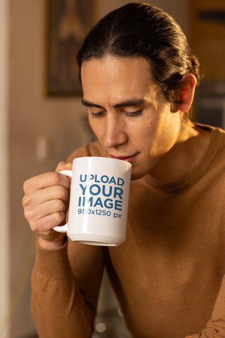 Placeit - Mockup of a Man Taking a Sip in His Coffee Mug