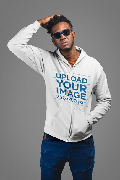 Placeit - Mockup of a Chill Man Wearing a Zip Up Hoodie in a Parking Lot