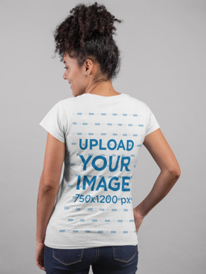 Placeit - Back View T-Shirt Mockup Featuring a Woman in a Studio