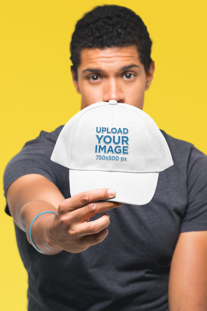 Placeit - Mockup of a Man Facing Backwards Wearing a Dad Hat in a Studio
