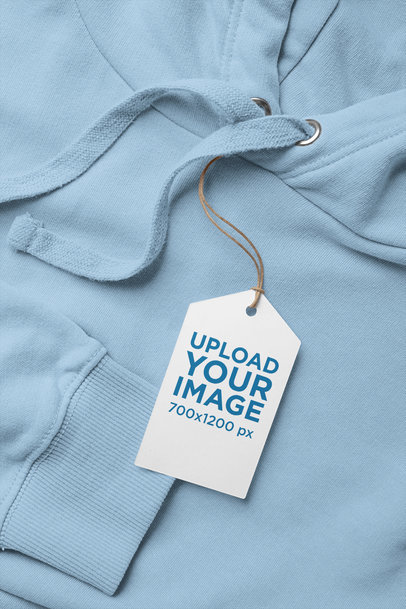 Placeit - Mockup of a Brand Tag on a Hoodie