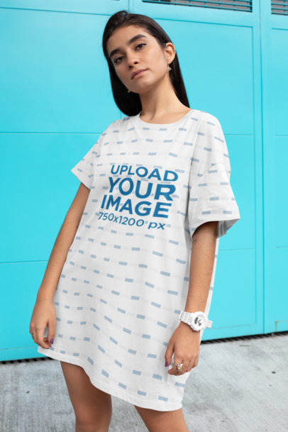 Placeit - Shift Dress Mockup of a Young Woman Posing in Front of a ...