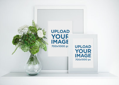 Placeit - Mockup of a Set of Three Poster Frames Against a Wall