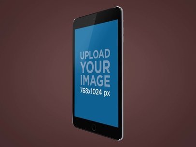 Placeit - iPad Mini Portrait Mockup Lying Angled on a Surface