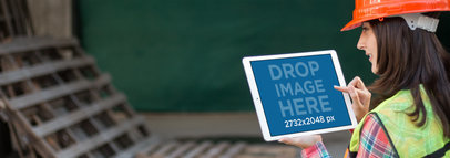 Placeit - iPad Construction Mockup of a Female Civil Engineer at Work