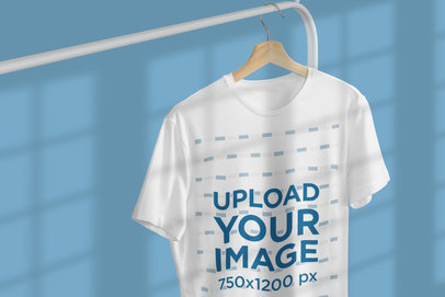 Placeit - T-Shirt Mockup Featuring a Stack of Folded T-Shirts