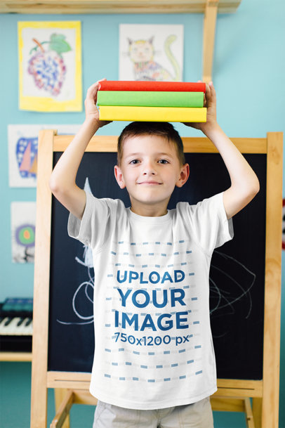Placeit - T-Shirt Mockup Featuring a Serious Boy at School