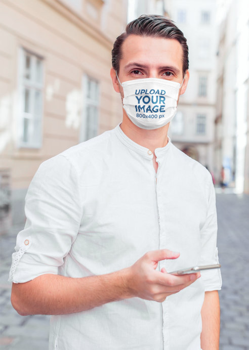 Placeit - Mockup of a Stylish Man Wearing a Face Mask