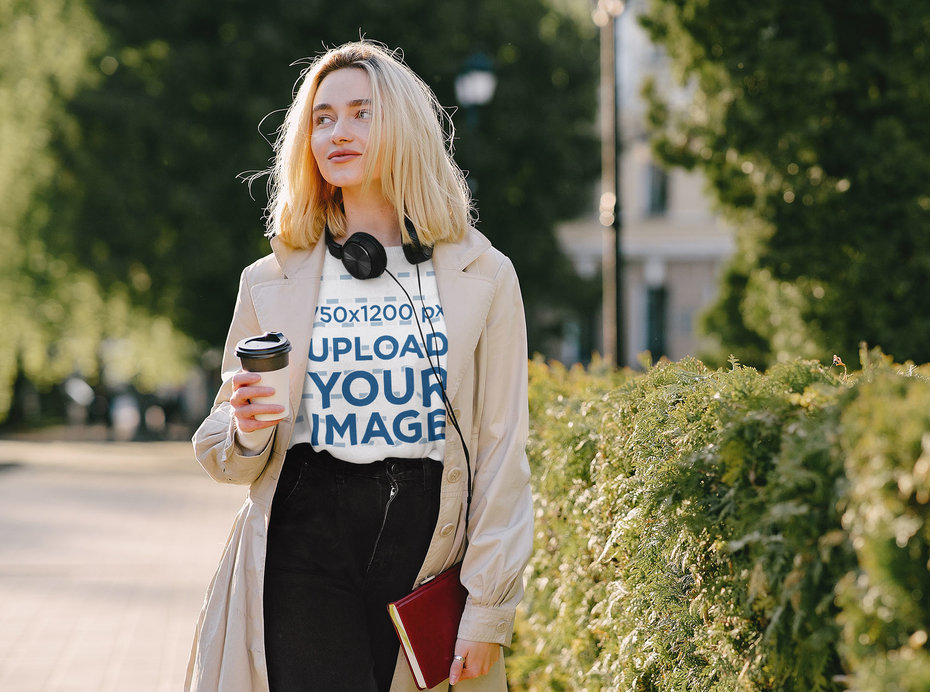 Placeit - Tee Mockup of a Trendy Woman Walking on Street
