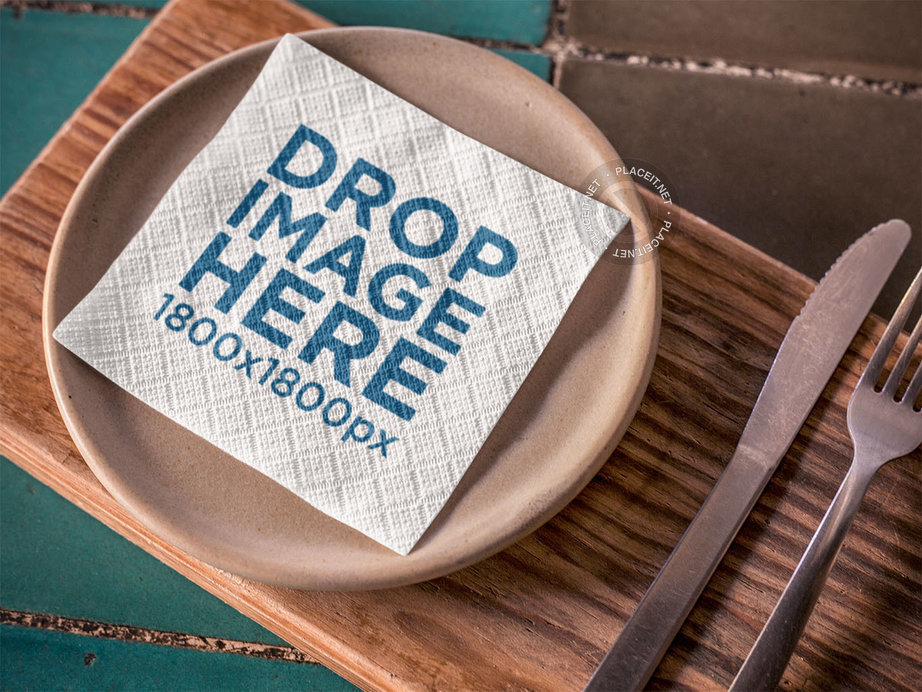 Placeit - Napkin Template on a Plate With Cutlery Besides