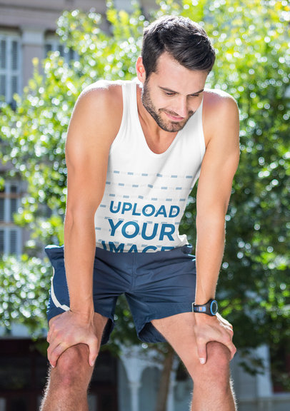 Placeit - Mockup of a Fit Man Wearing a Ringer Tank Top
