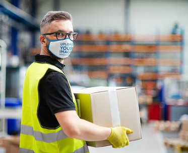 Placeit - Face Mask Mockup Featuring a Warehouse Worker Wearing Safety Gear