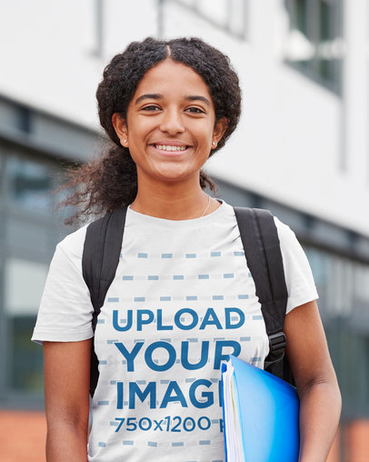 Placeit - Mockup of a College Student Wearing a Basic T-Shirt