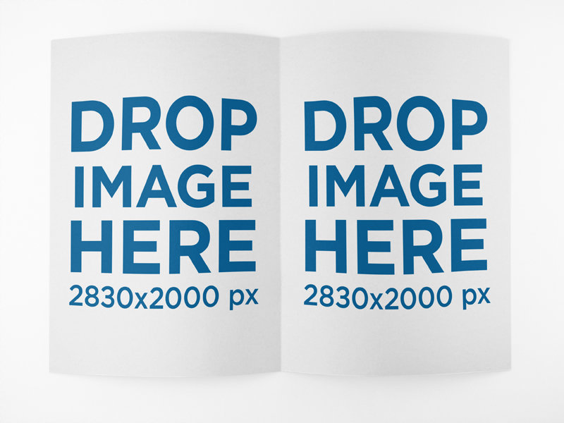 Placeit - Open Booklet Template Lying on a Solid Surface