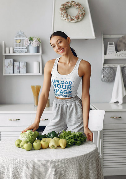 Placeit - Heather Tank Top Mockup Featuring a Woman Cooking