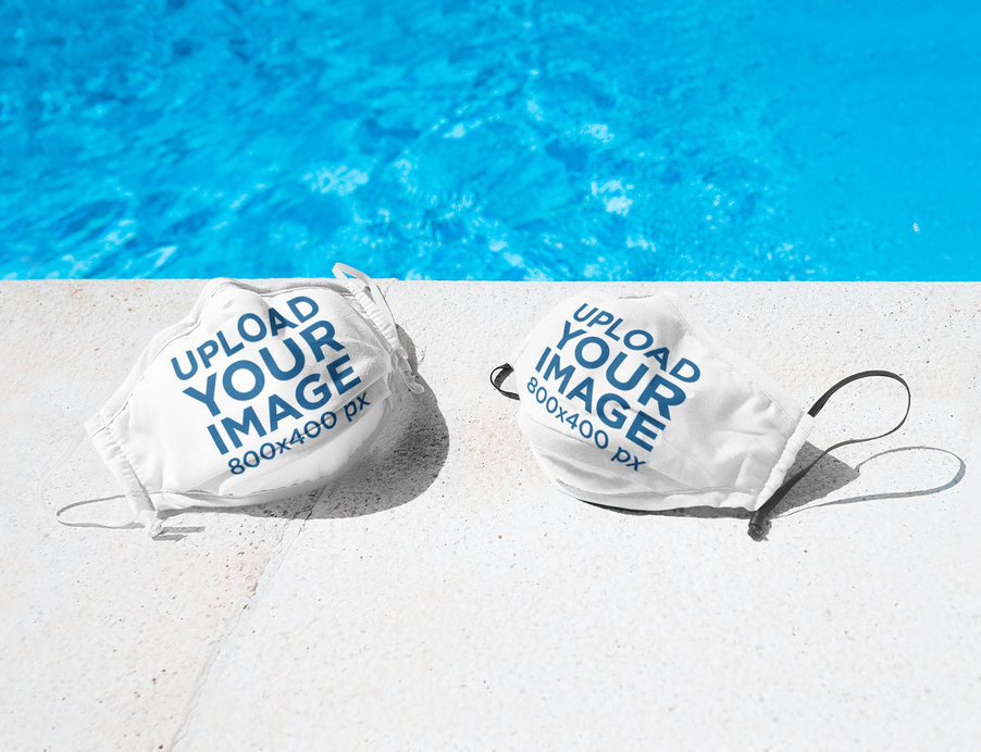 Placeit - Mockup of Two Face Masks Placed by a Pool