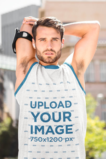 Placeit - Ringer Tank Top Mockup Featuring a Man Warming Up Before a Run