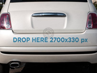 Placeit - Mockup of a Sticker on the Back of a White Car