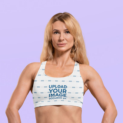 Placeit - Sports Bra Mockup of a Woman Jumping at a Studio