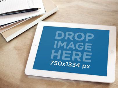 Placeit - Mockup of an iPad in Landscape Position on a Wooden Table