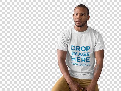Placeit - Front and Back T-Shirt Mockup of a Man at a Studio Looking Down
