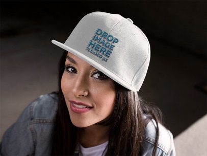 Placeit - Mockup of Smiling Young Woman Wearing a Snapback Hat