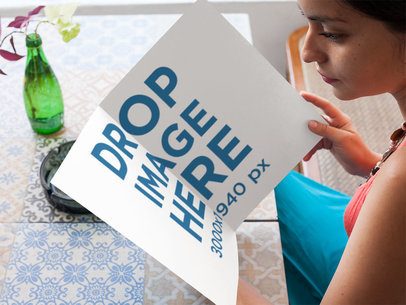 Placeit - Young Woman Reading a Restaurant Menu While Sitting Down Template